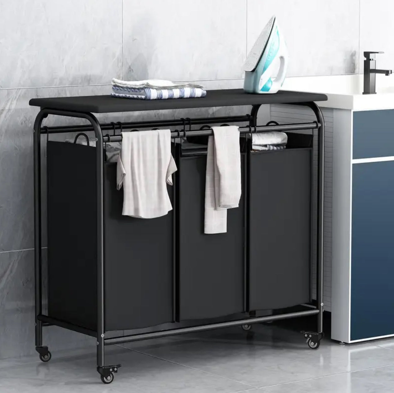 3 Compartment laundry basket with lockable wheels and ironing board ...